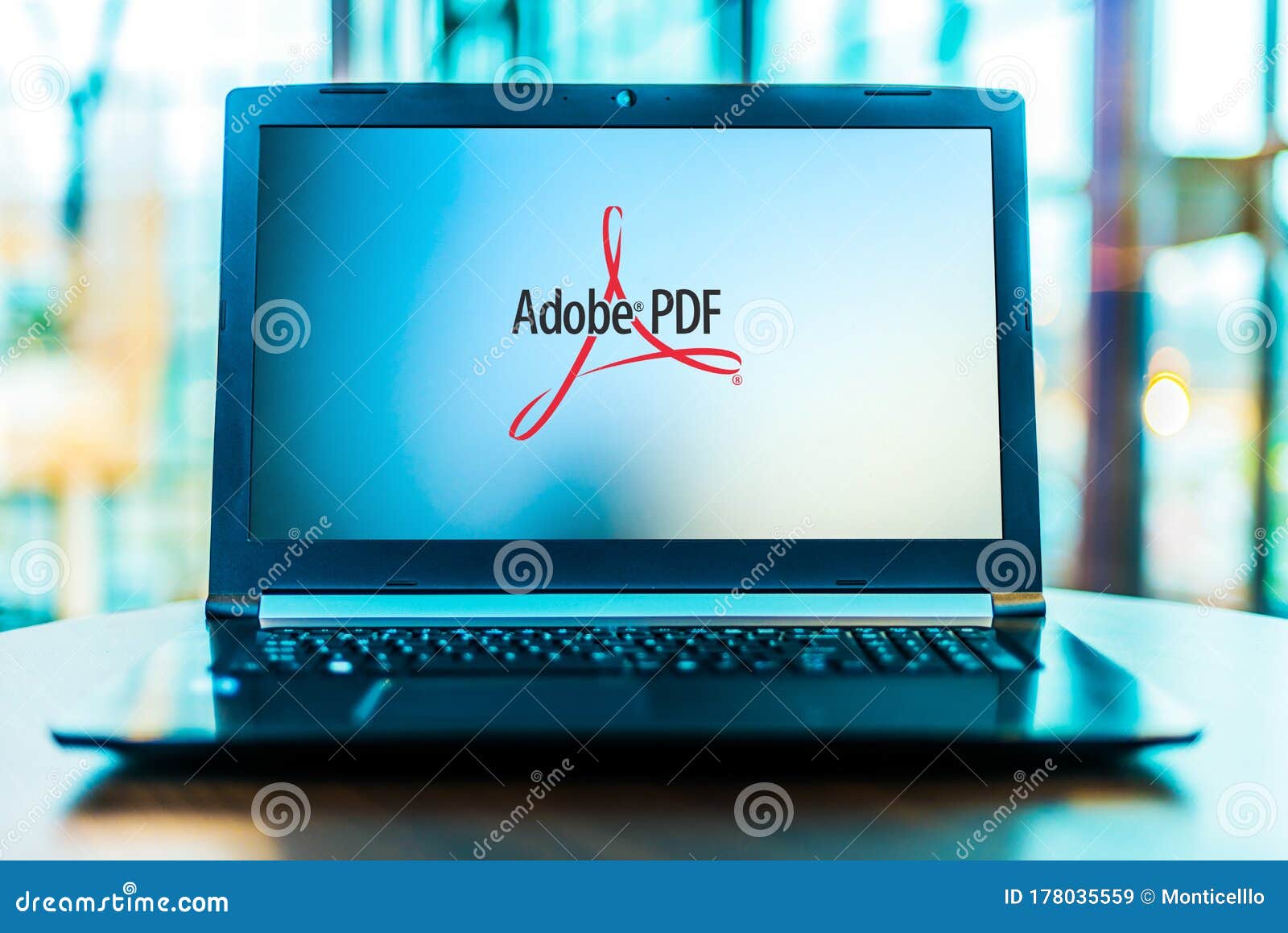 Laptop Computer Displaying Logo of Adobe Acrobat Editorial Stock Image ...