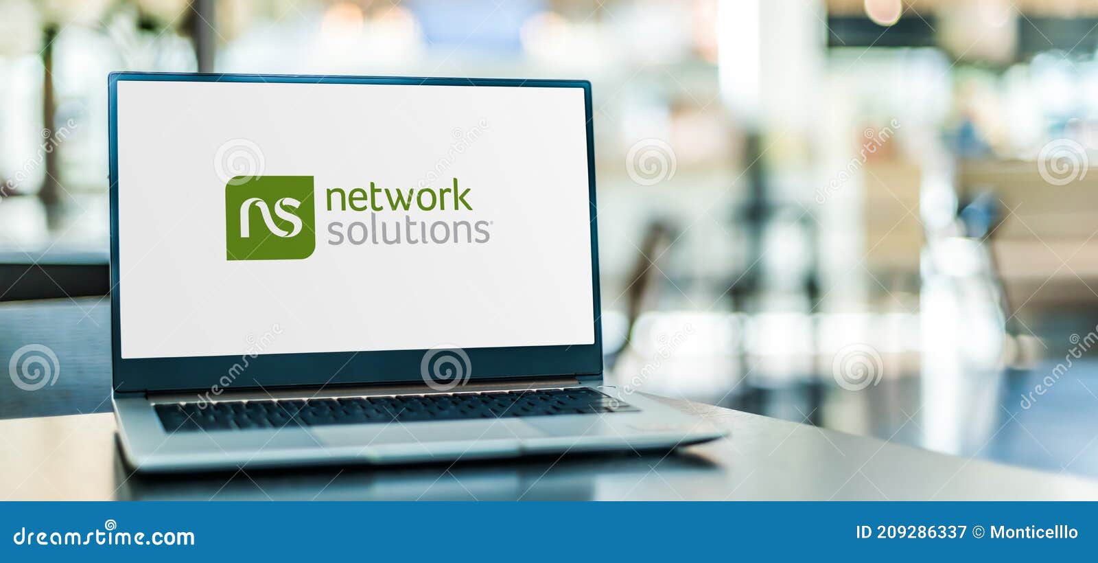 Laptop Computer Displaying Logo of Network Solutions Editorial ...