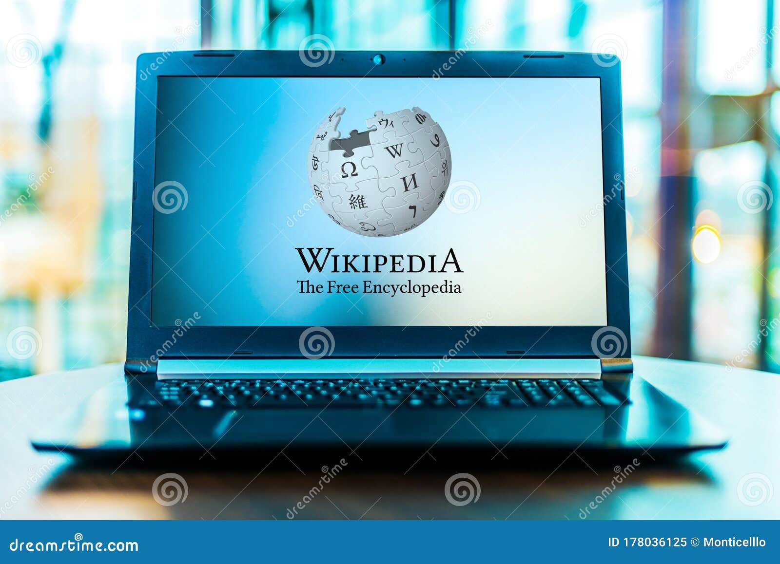 Laptop Computer Displaying Logo of Wikipedia Editorial Image - Image of ...