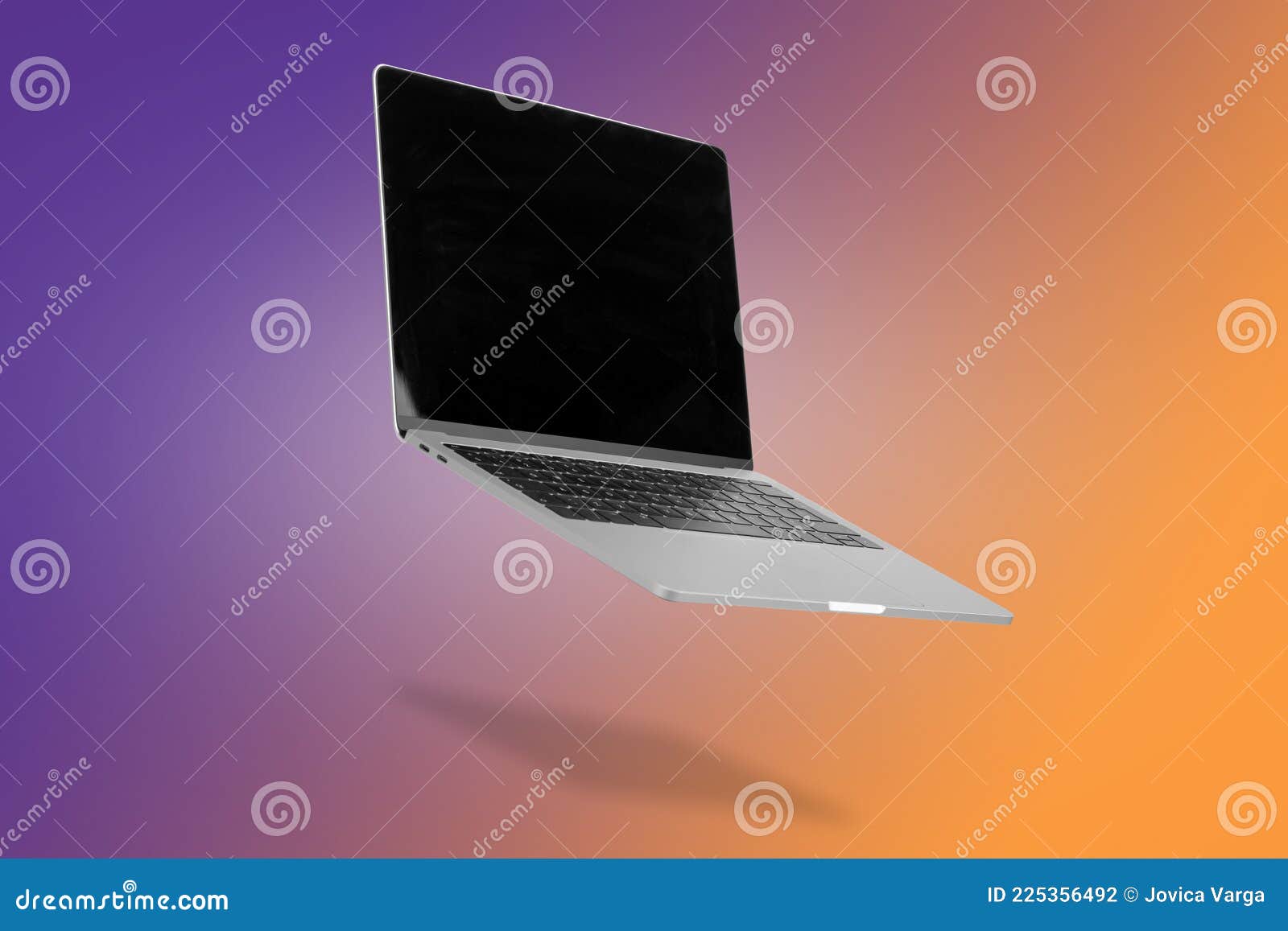 Laptop Computer with Empty Screen while Levitating in the Air on a ...