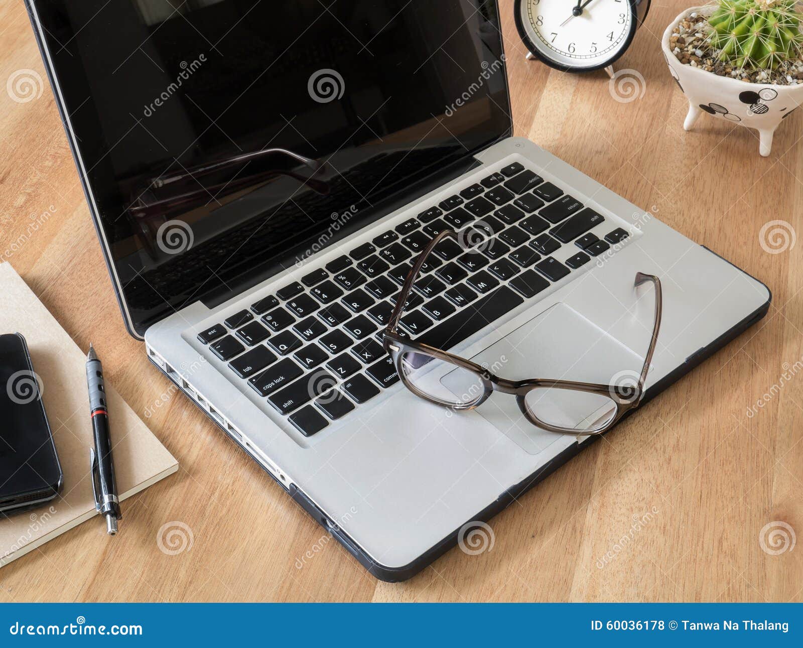 Laptop Computer with Eyeglasses on Wooden Desk Editorial Stock Photo ...