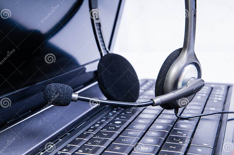 Laptop Computer with Headset on Keyboard Stock Image - Image of concept ...