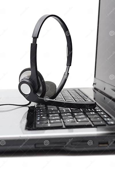 Laptop Computer with Headset on Keyboard Stock Image - Image of contact ...