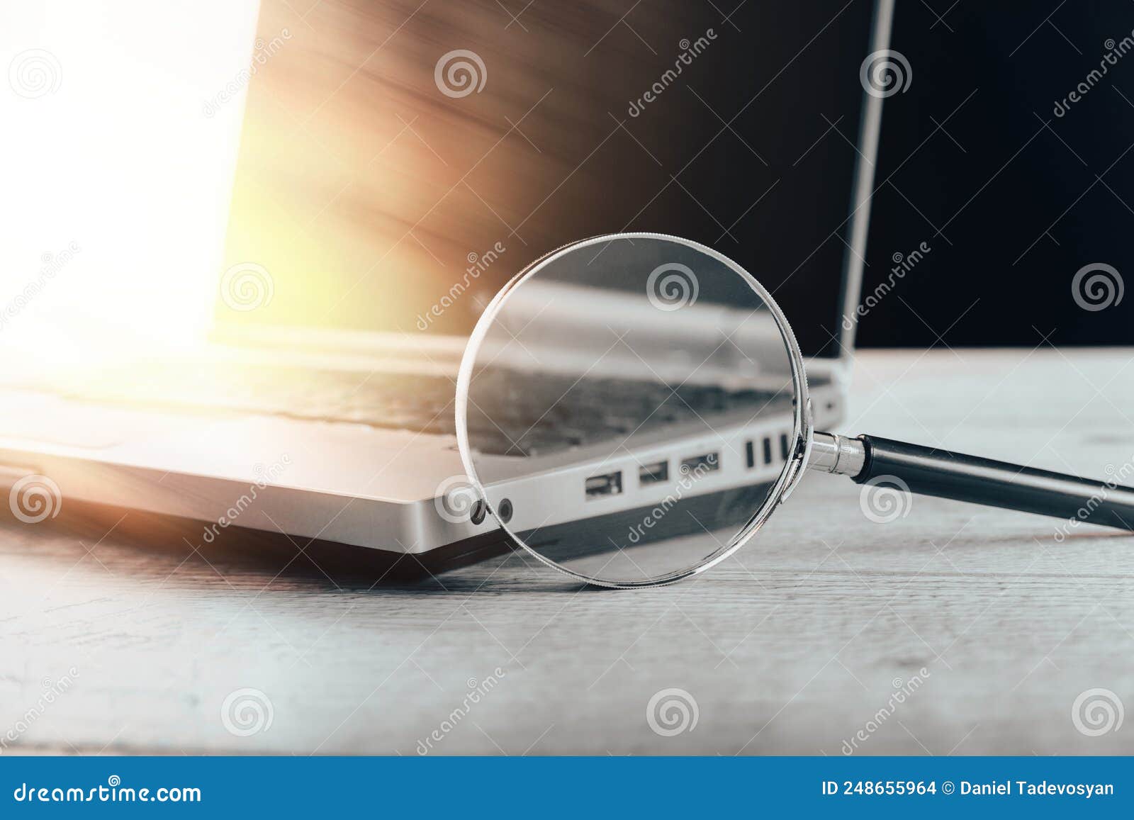 Laptop Computer with Magnifying Glass Stock Photo - Image of ...