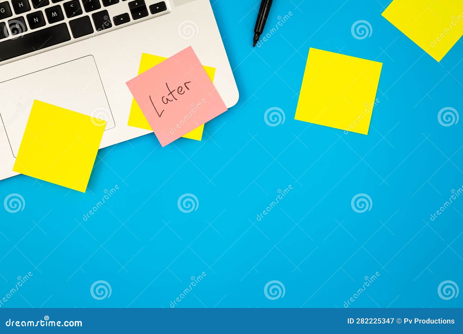 Laptop Computer with Many Sticky Notes on a Blue Background, Flat Lay ...