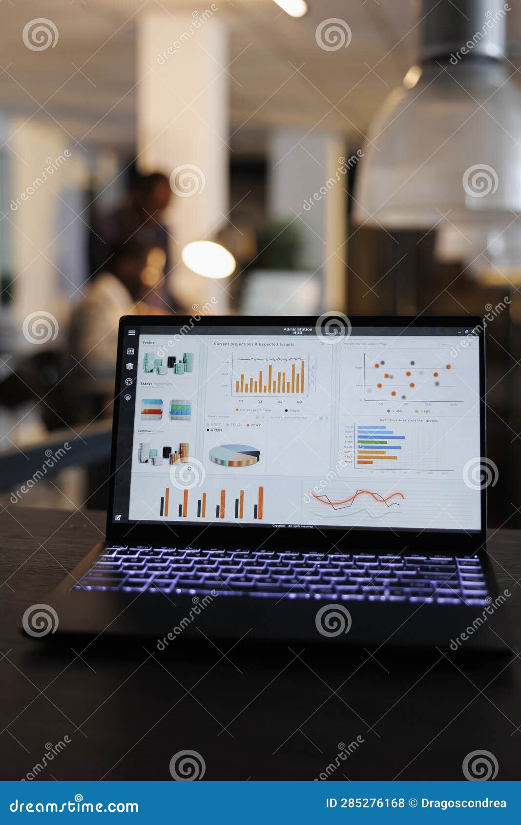 Laptop Computer with Marketing Statistics Graphs on Screen Stock Photo ...