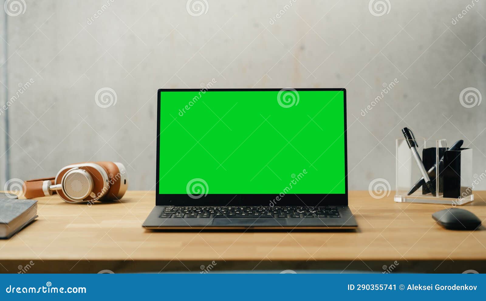 Laptop Computer with Mock Up Green Screen Display Standing on a Desk ...