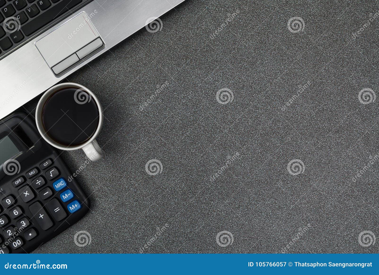 Laptop Computer or Notebook, Calculator and Cup of Coffee on Working ...