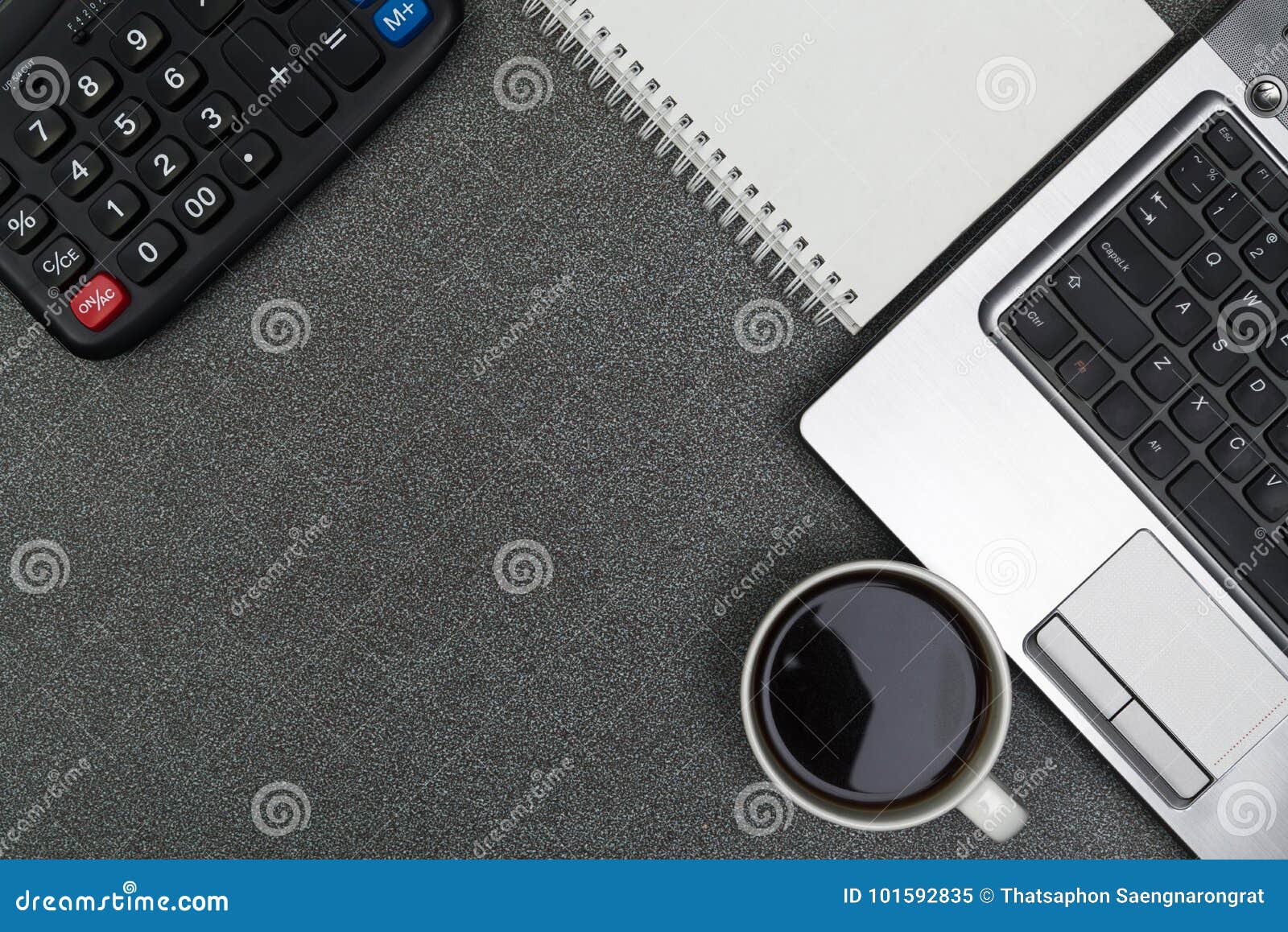 Laptop Computer or Notebook, Calculator and Cup of Coffee on Working ...