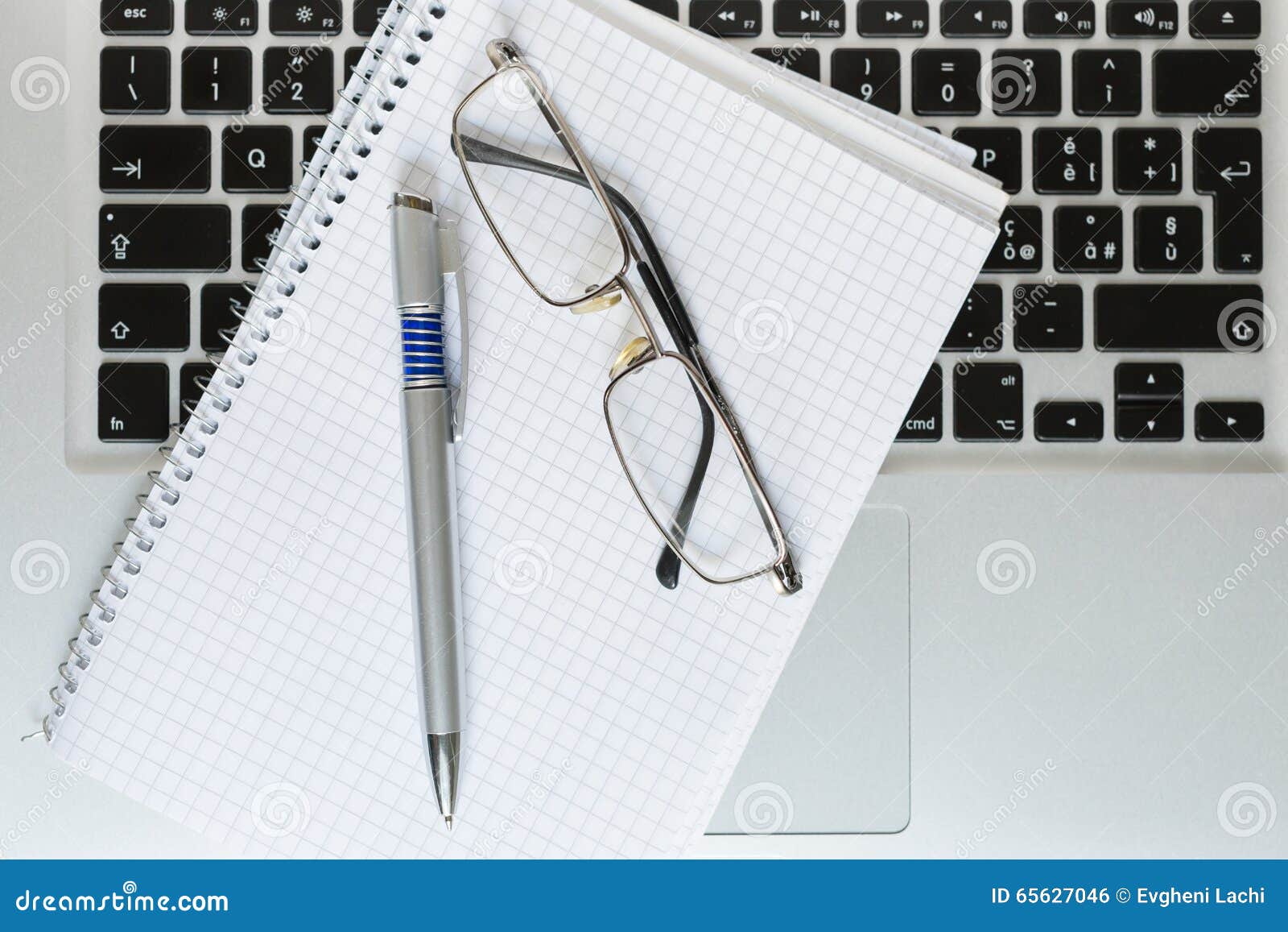 Laptop Computer with Notepad, Pen, Glasses and Keyboard Stock Photo ...