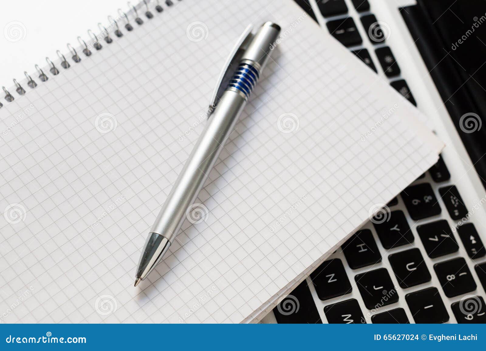 Laptop Computer with Notepad, Pen on Ivory Table Stock Photo - Image of ...