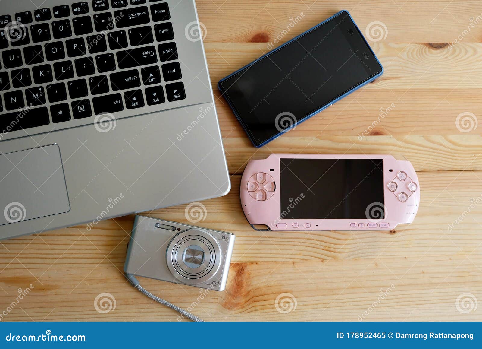 Laptop Computer and Portable Game Console, Smart Phone and Digital ...