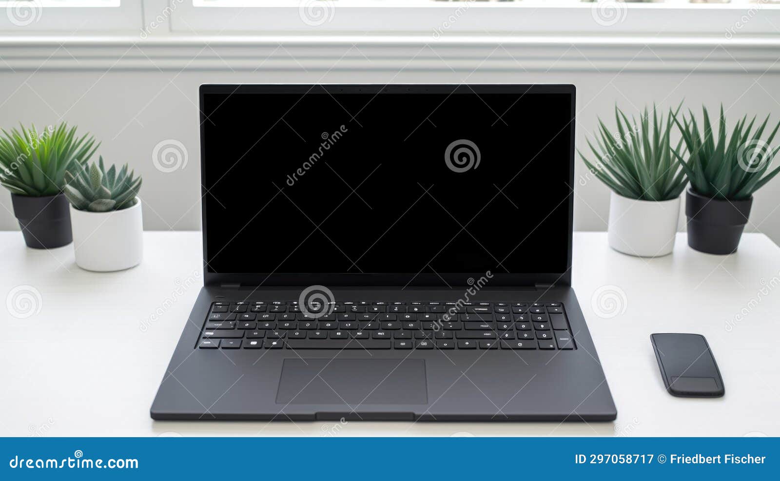 A Laptop Computer Sitting on Top of a White Desk Stock Image - Image of ...
