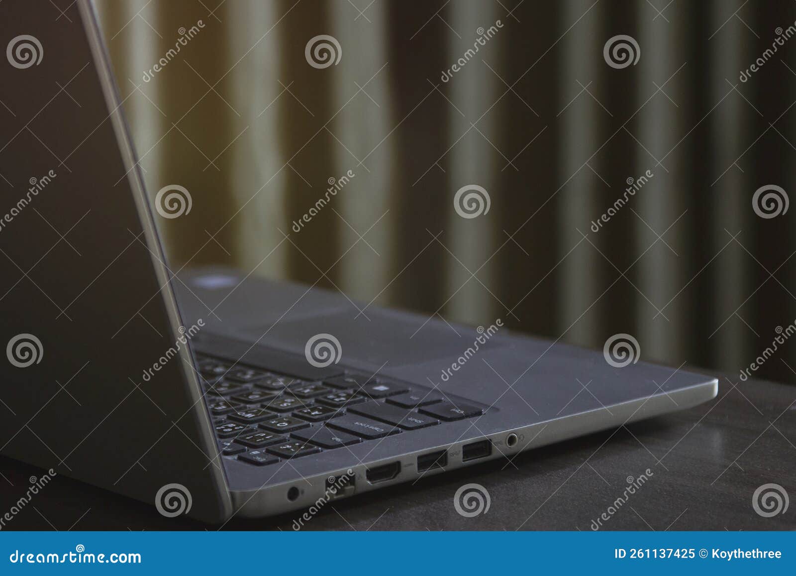 A Laptop Computer on the Table in Room. and Used in Business Concept ...