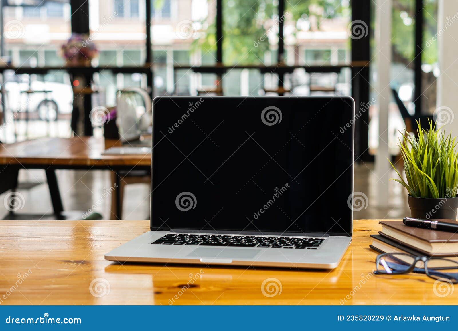 Laptop Computer with Tiger Skin and Glasses on the Desk Stock Image ...