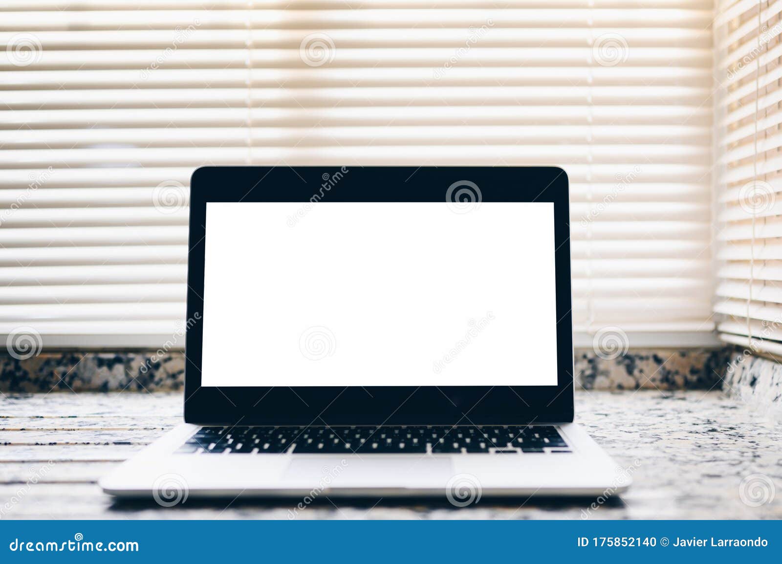 Laptop Computer with White Screen with Soft and Warm Light Coming ...