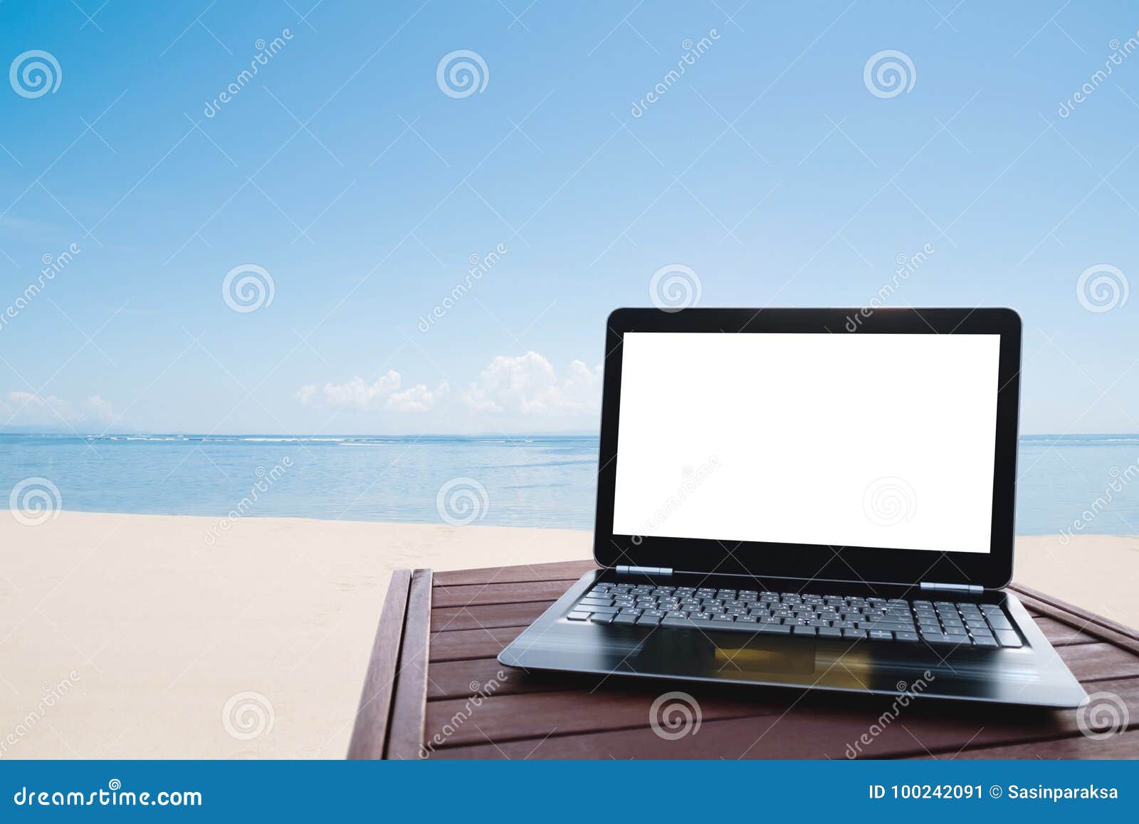 Laptop Computer on Wood Table at the Beach in Summer. Clipping Path ...