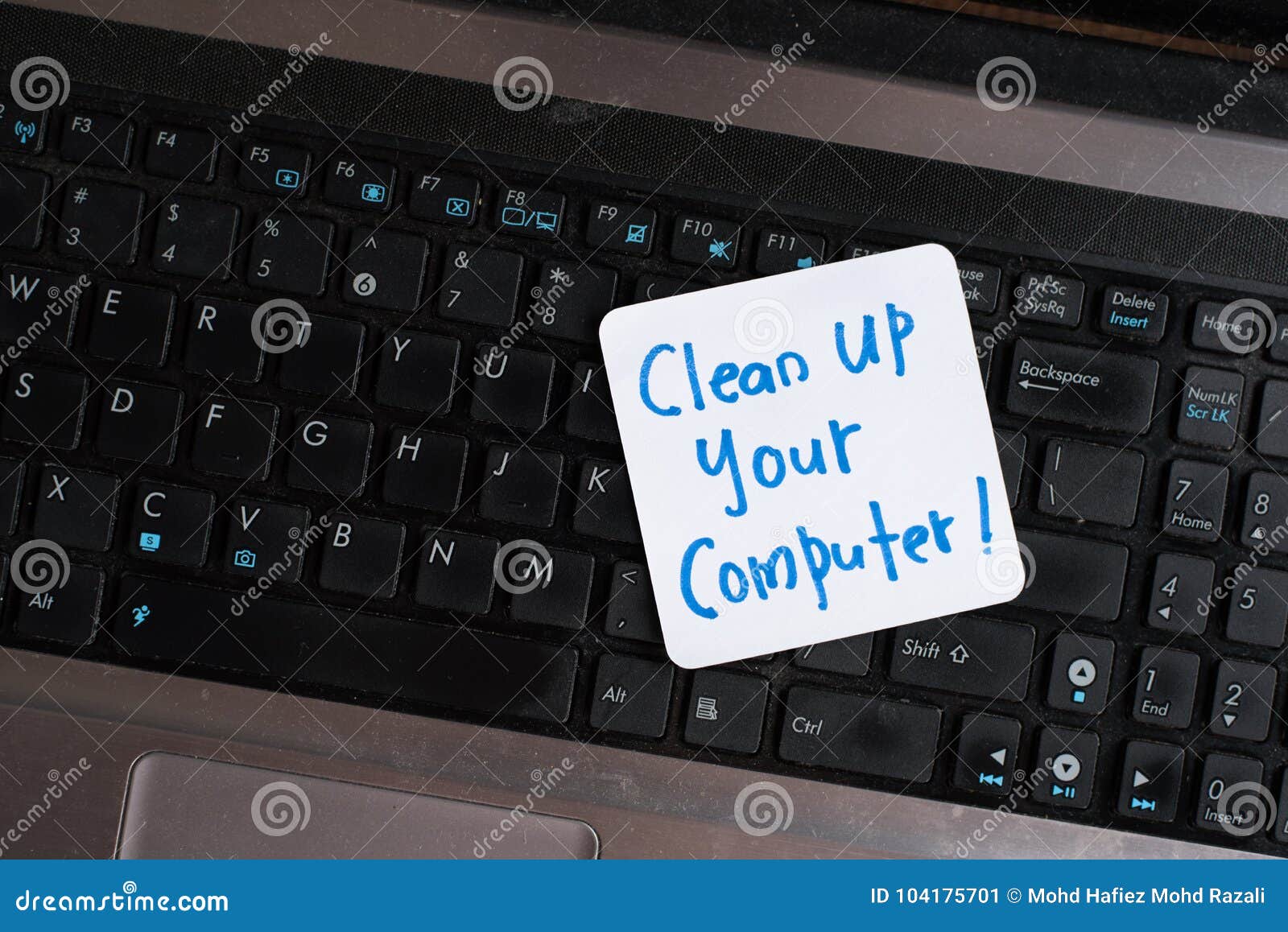 Laptop Computer on Wooden Table with Note CLEAN UP YOUR COMPUTER Stock ...