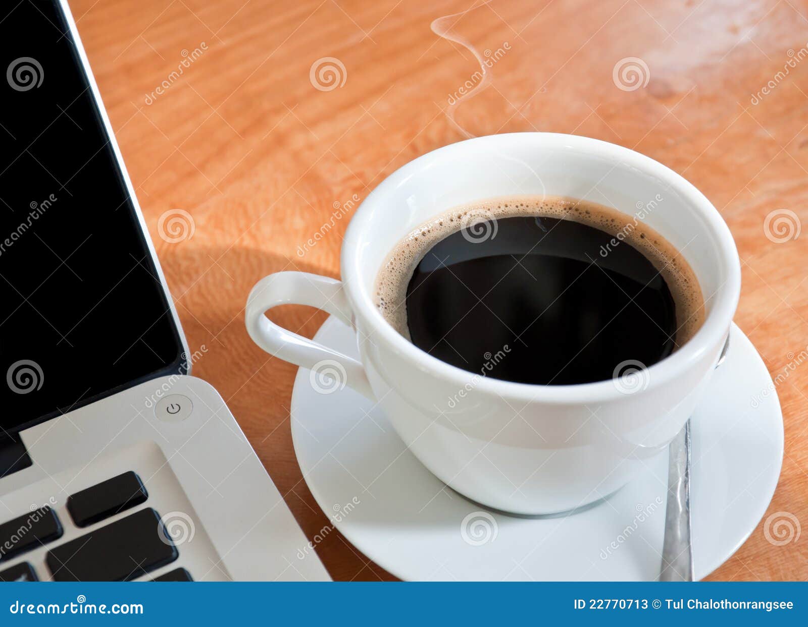 Laptop and a cup of coffee stock image. Image of desktop - 22770713