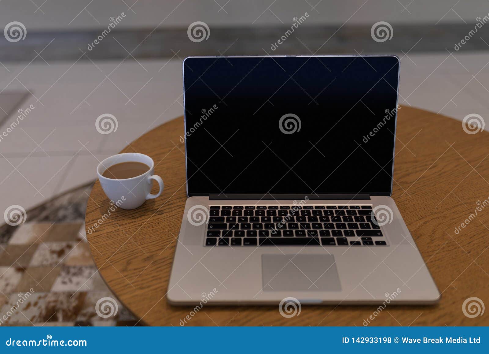 Laptop and Cup of Tea on a Table in the Lobby Stock Photo - Image of ...