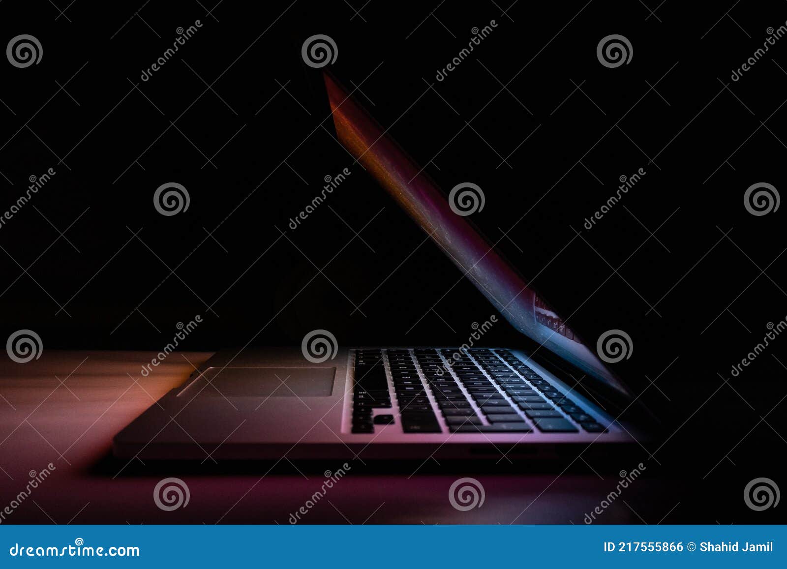 A Laptop in the Dark from the Side Stock Photo - Image of black, design ...