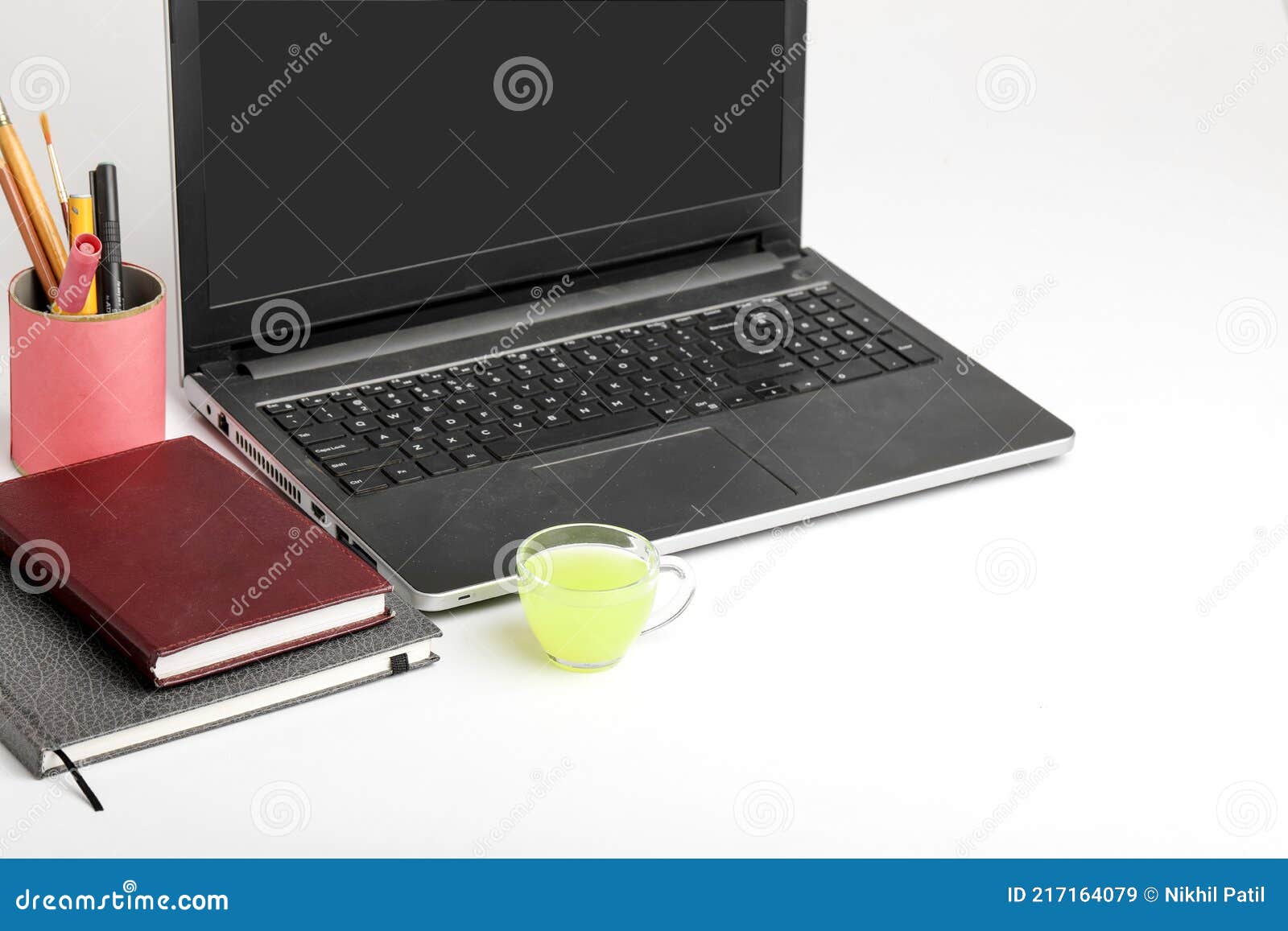 Laptop and Diary with Cup of Green Tea. Work from Home Concept Stock ...