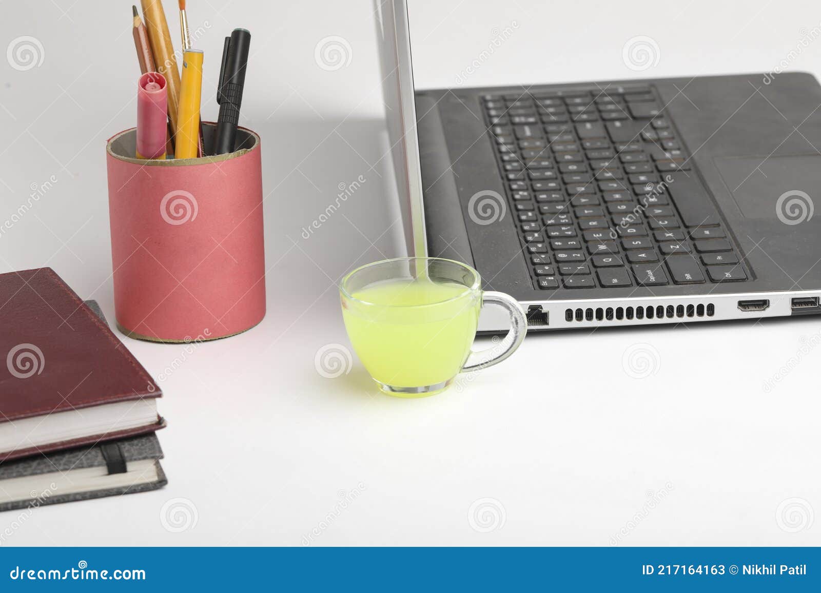 Laptop and Diary with Cup of Green Tea. Work from Home Concept Stock ...