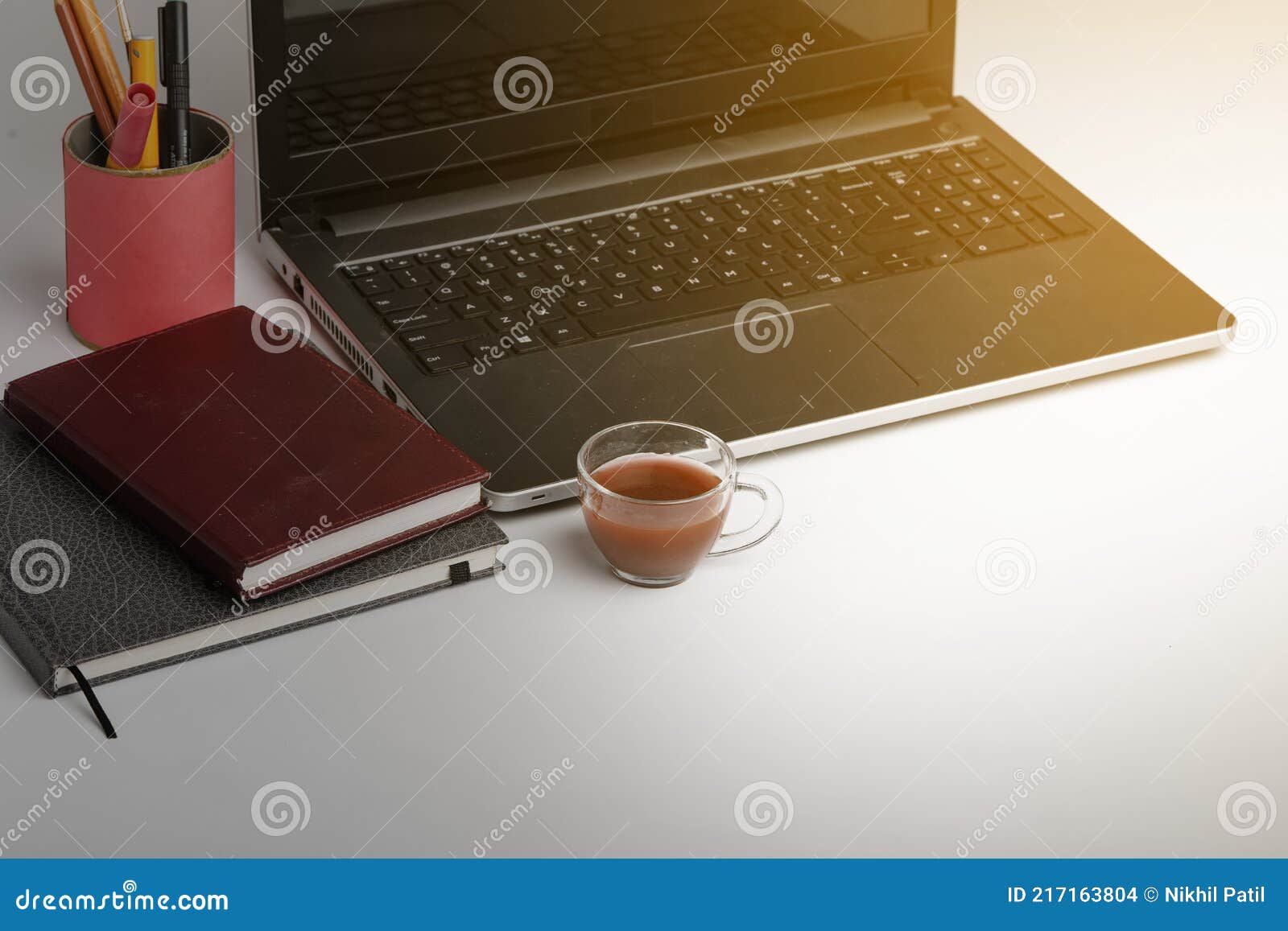 Laptop and Diary with Cup of Tea. Work from Home Concept Stock Photo ...
