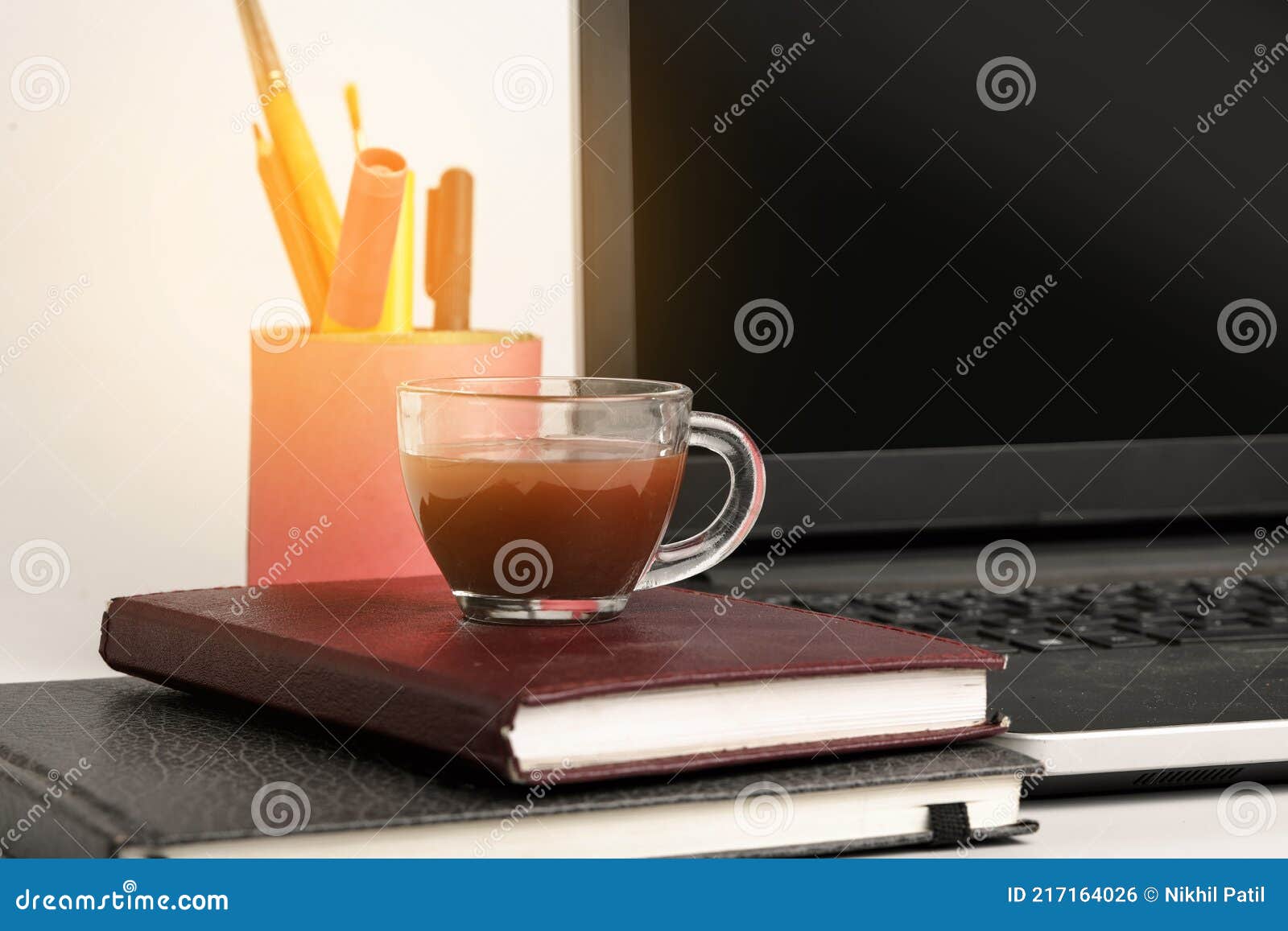 Laptop and Diary with Cup of Tea. Work from Home Concept Stock Photo ...
