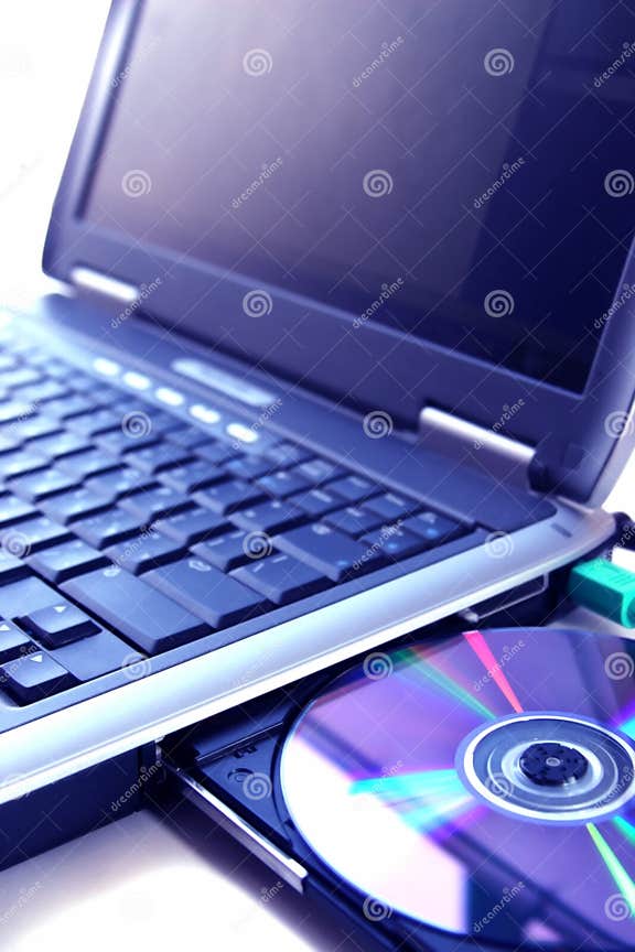 Laptop and a disc stock image. Image of buttons, office - 1176359