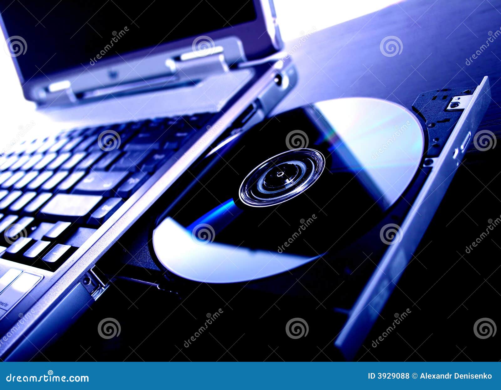 Laptop with a disk dvd stock photo. Image of multi, mobility - 3929088