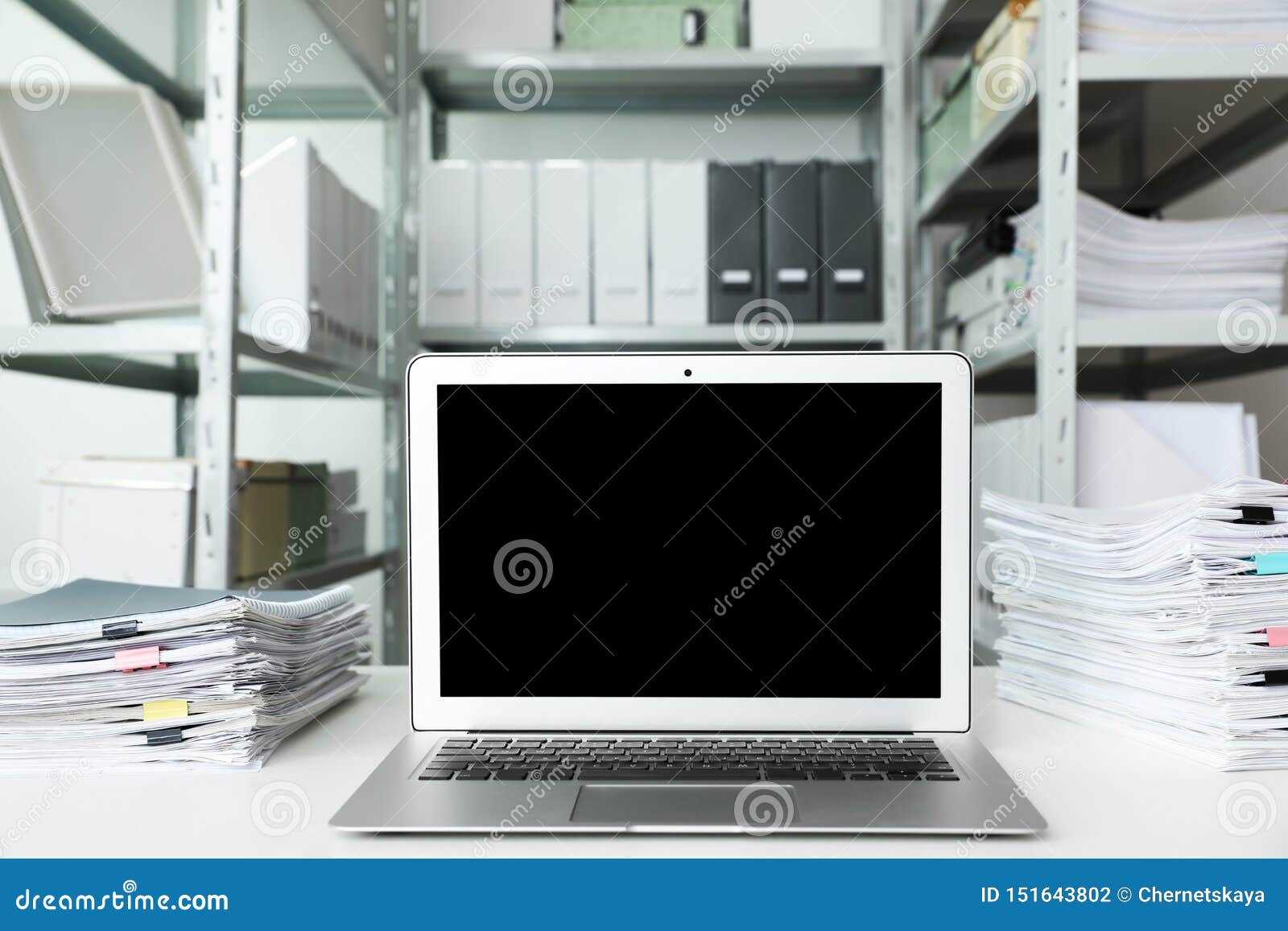 Laptop and Documents on Desk in Office Stock Photo - Image of corporate ...