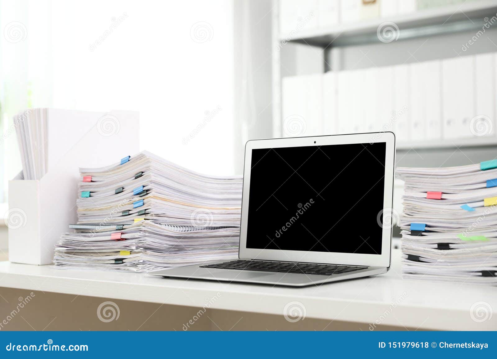 Laptop and Documents on Desk in Office Stock Photo - Image of documents ...