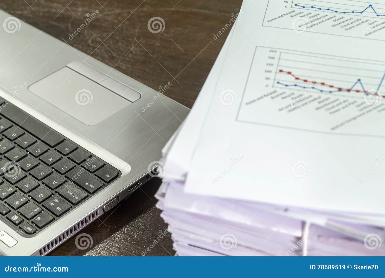 Laptop and documents stack stock image. Image of information - 78689519