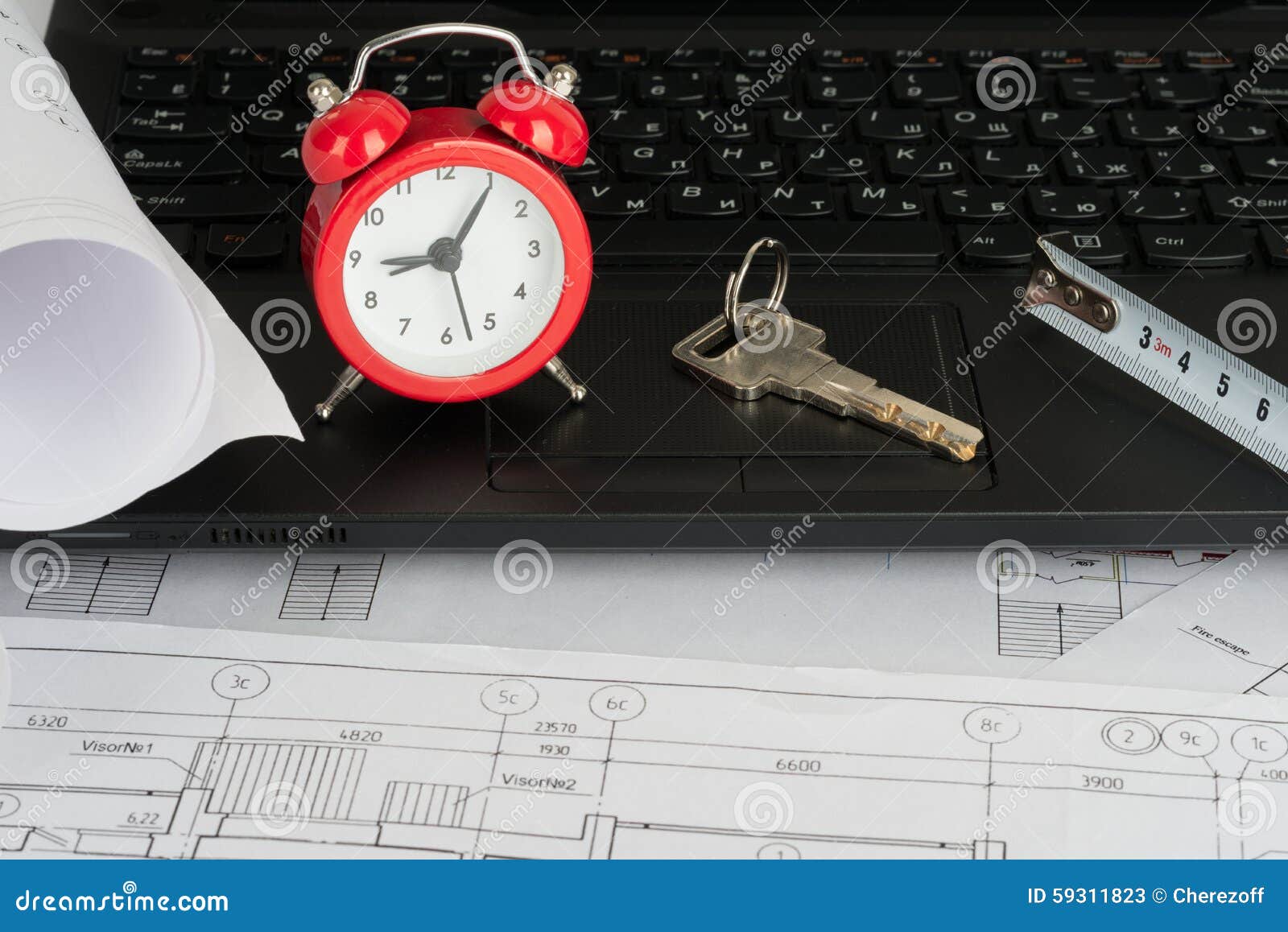 Laptop with drafts and key stock image. Image of draft - 59311823