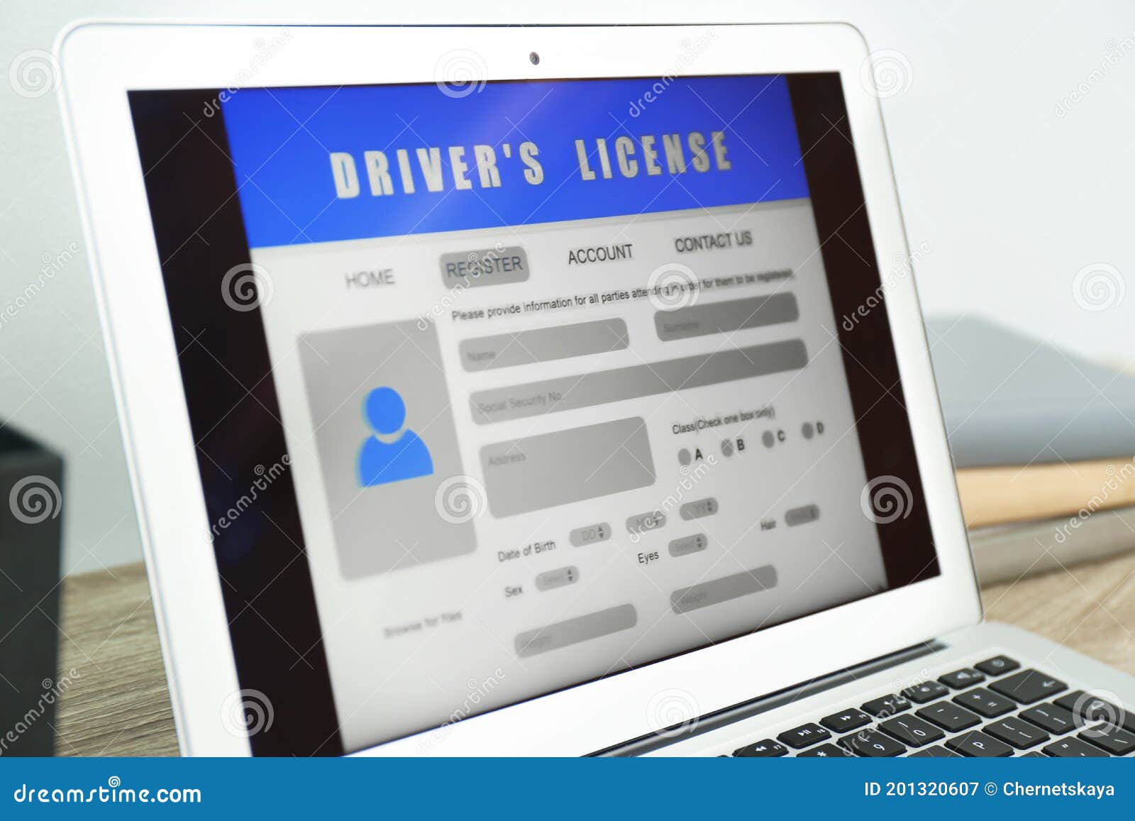 Laptop with Driver`s License Application Form on Table, Closeup Stock ...