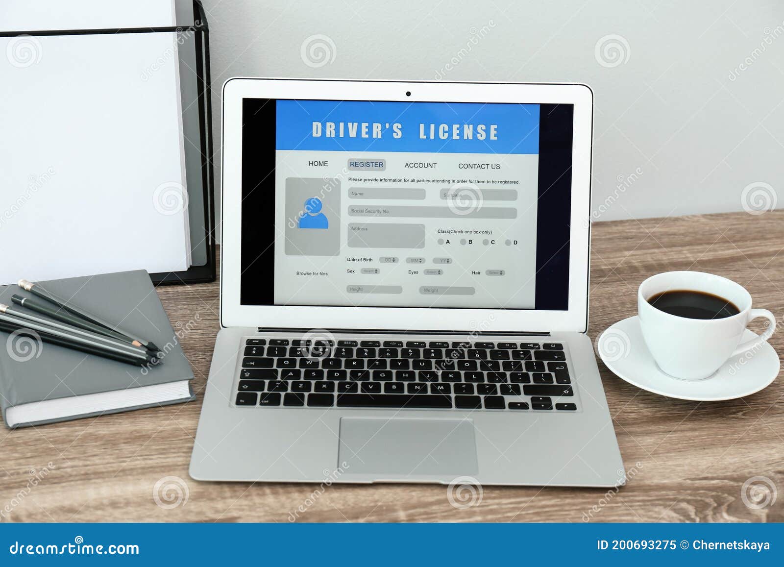 Laptop with Driver`s License Application Form on Table in Office Stock ...