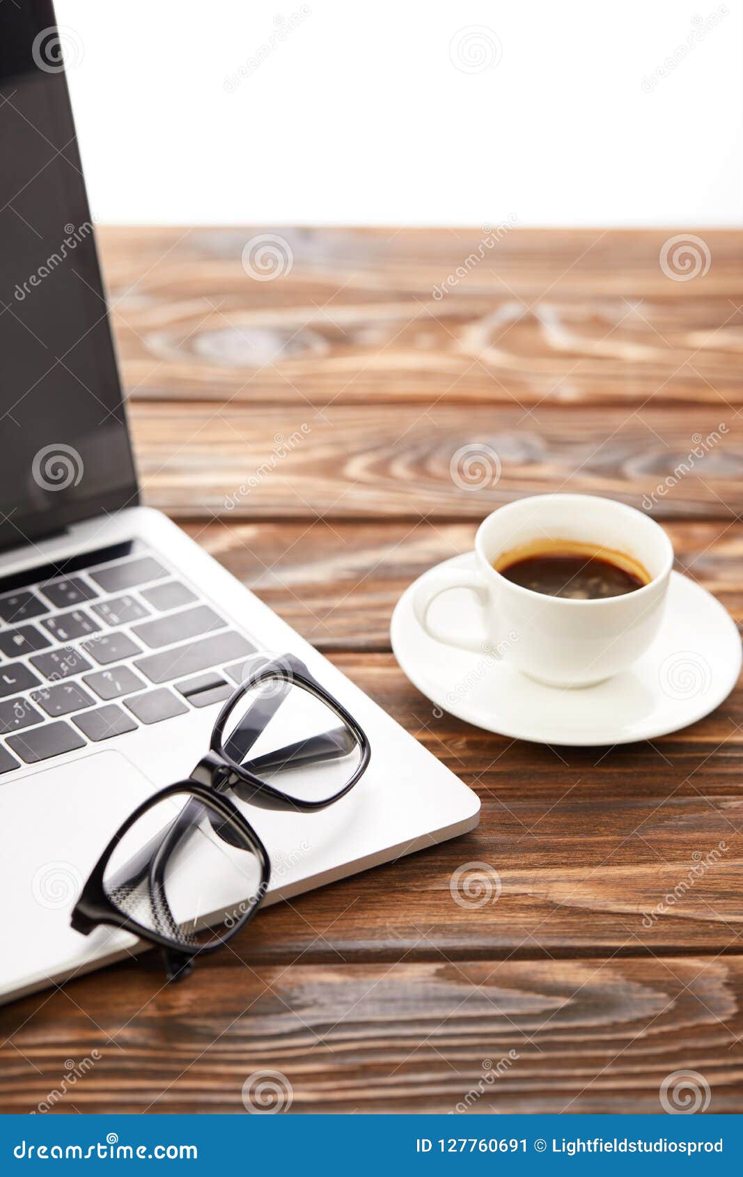 Laptop, Eyeglasses and Coffee Cup on Wooden Surface Stock Image - Image ...