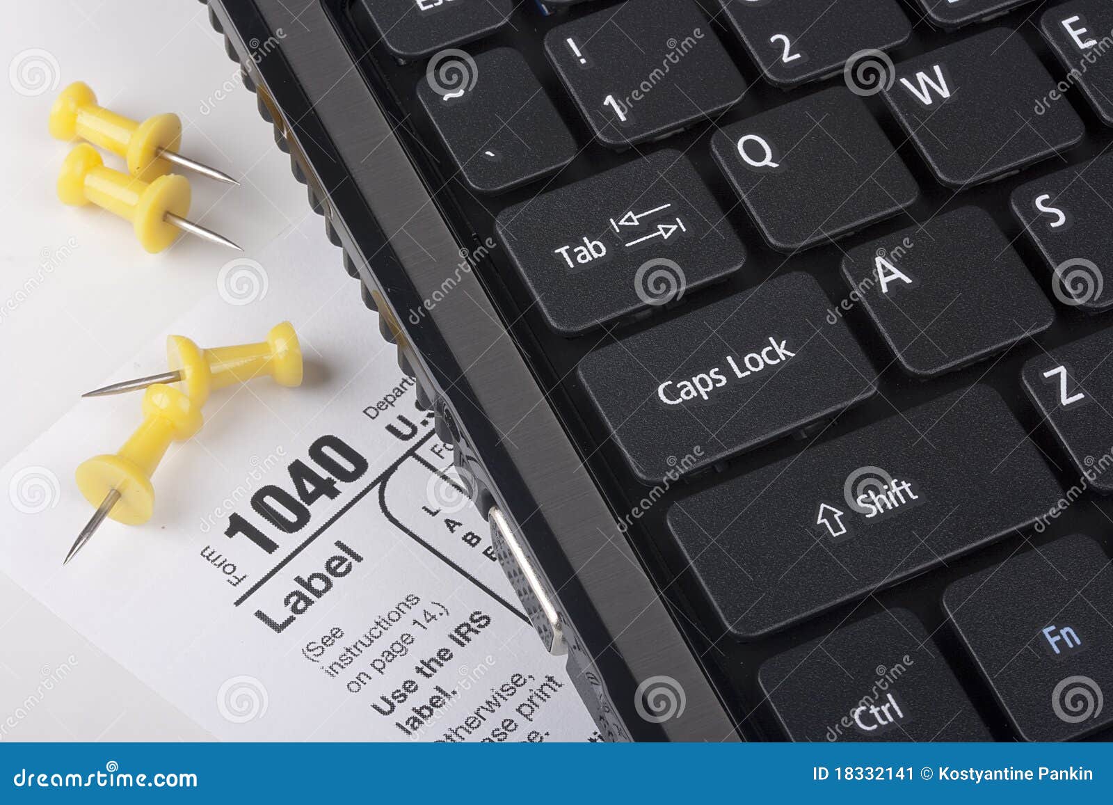 Laptop with a form 1040 editorial photo. Image of keyboard - 18332141