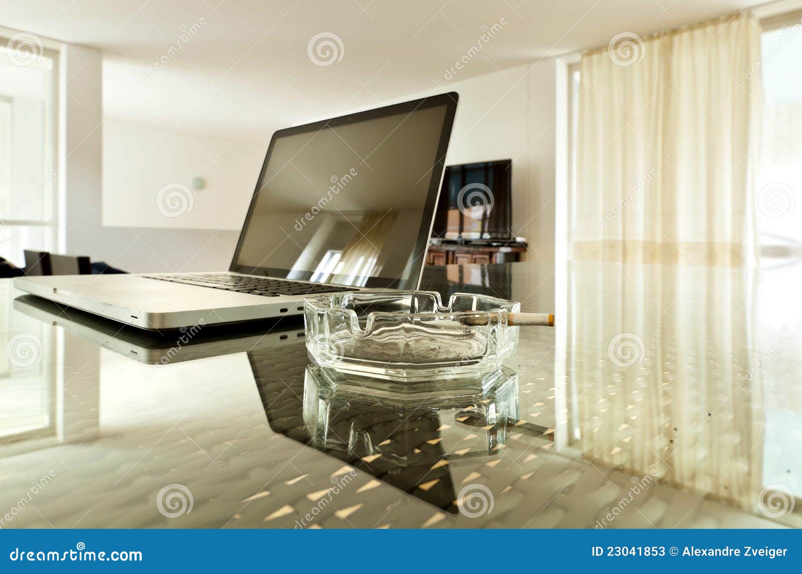Laptop on the glass table stock image. Image of apartment - 23041853