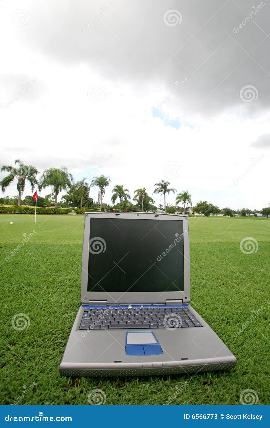 Laptop on a golf course stock image. Image of sitting - 6566773