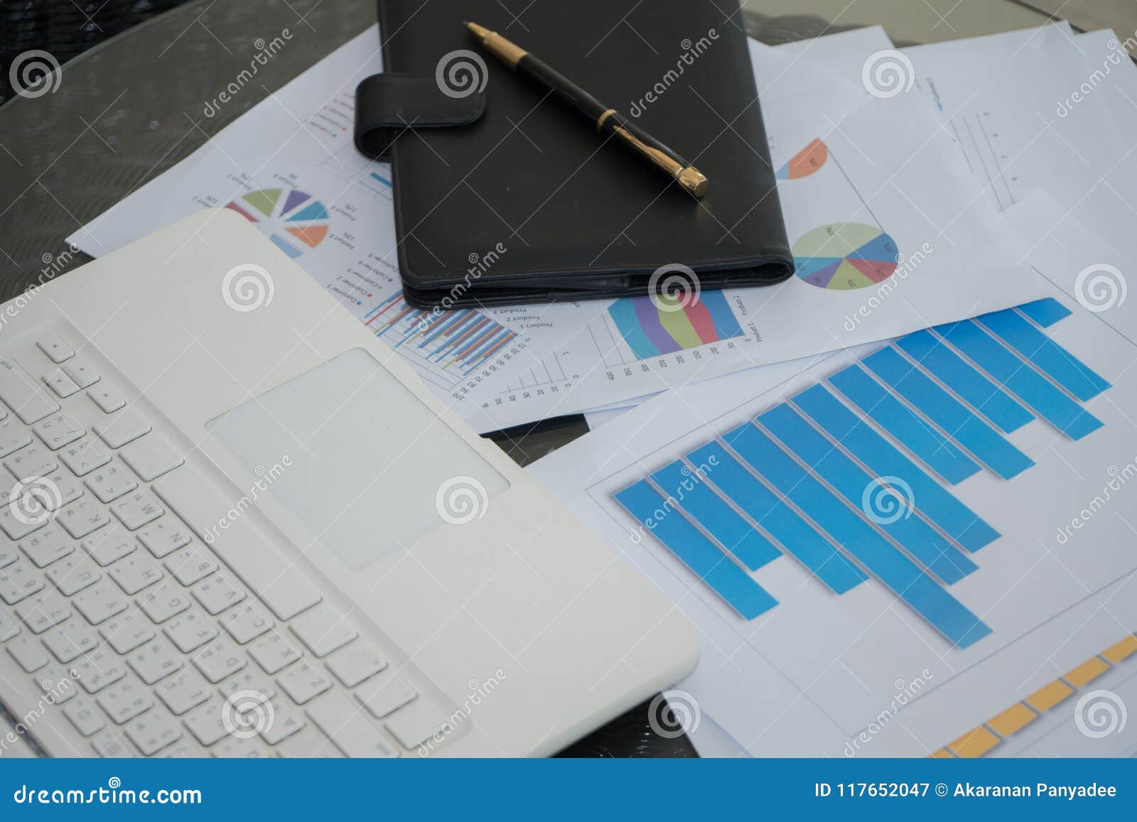 Laptop, Report Documents, Pen, Notebook on the Office Desk Stock Image ...
