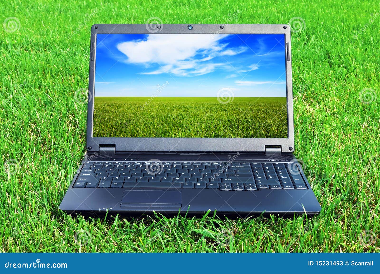 Laptop on grass stock image. Image of energy, network - 15231493