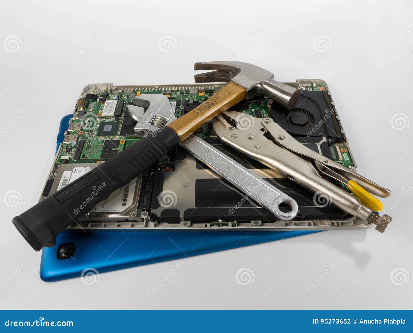Laptop with Hammer, Spanners and Locking Pliers Stock Photo - Image of ...
