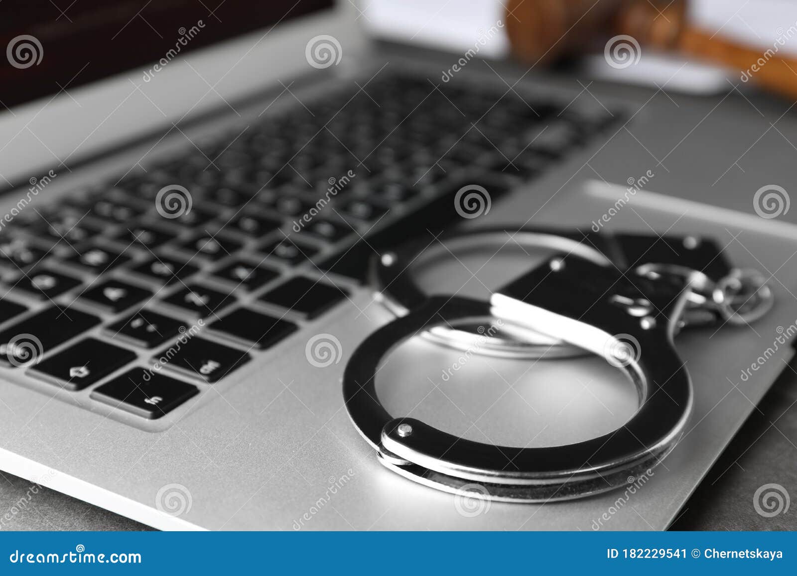 Laptop and Handcuffs on Table. Cyber Crime Stock Image - Image of ...