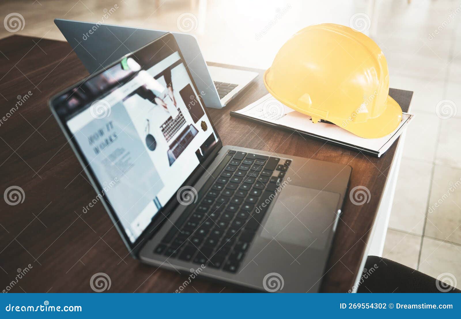 Laptop, Hardhat and Desk in an Industry Office for Engineering ...
