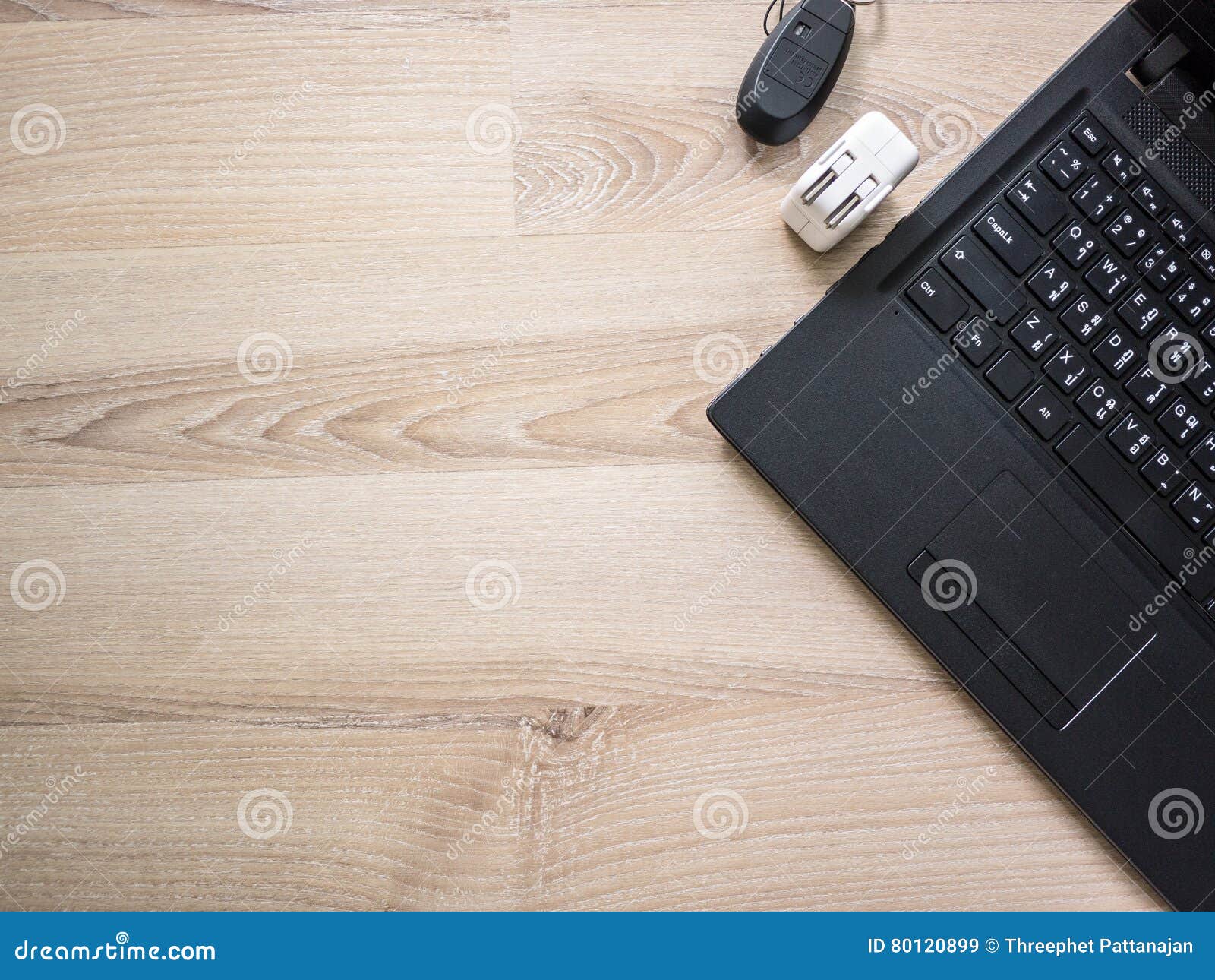 Laptop, Key Car, Charger on the Table on Working Day Stock Image ...