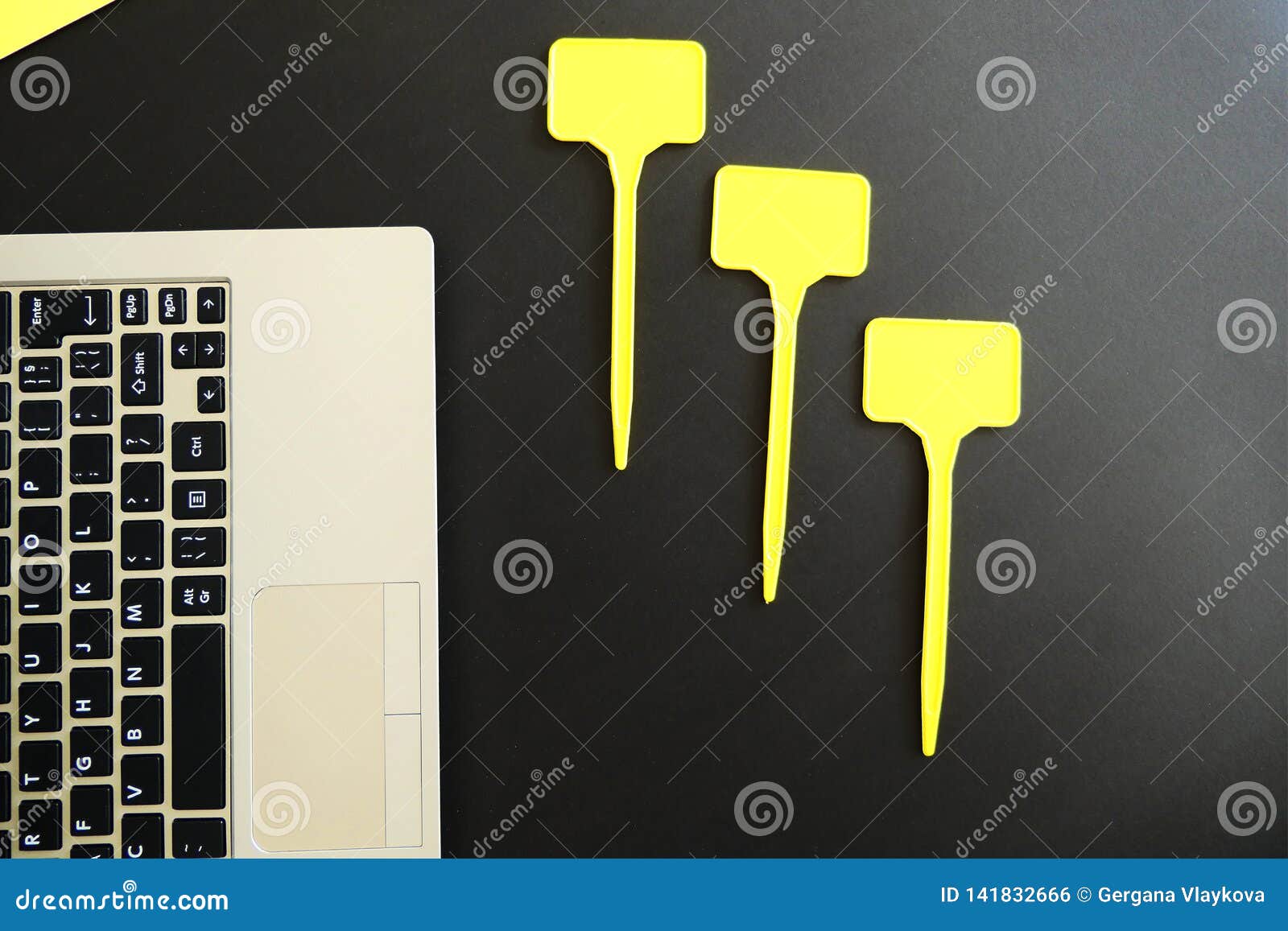 Laptop Keyboard and Empty Yellow Labels on Black Background Stock Photo ...