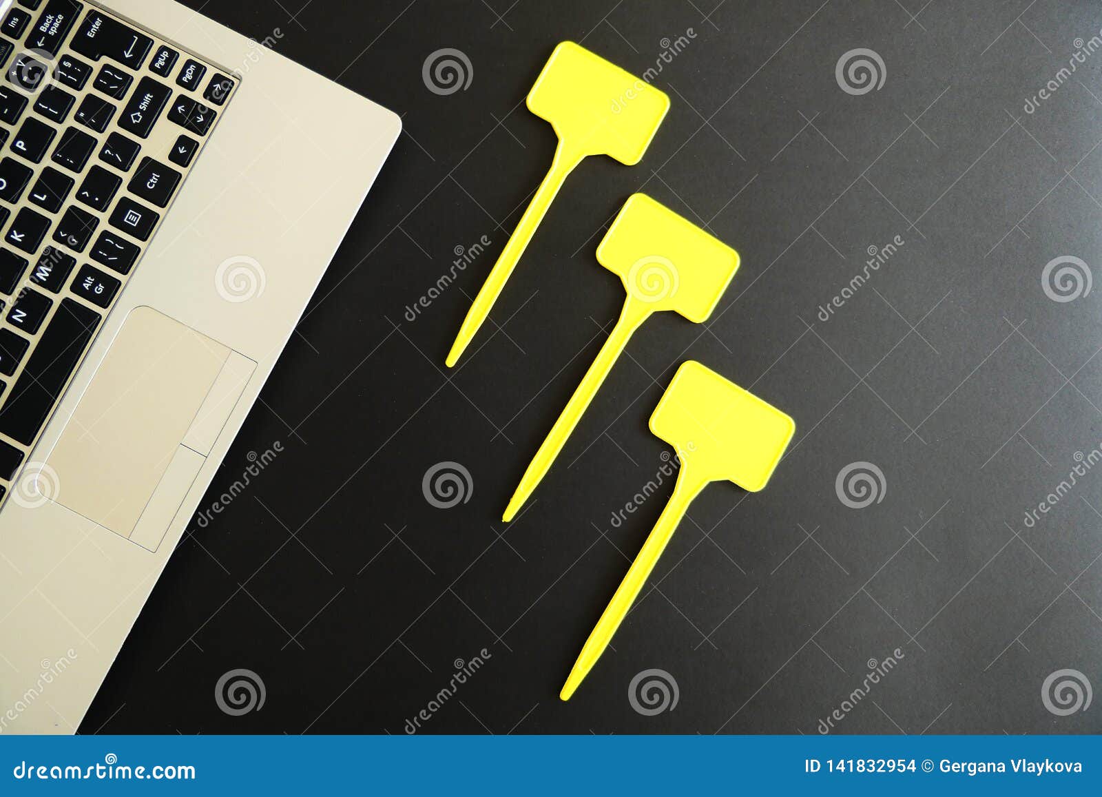 Laptop Keyboard and Empty Yellow Labels on Black Background Stock Photo ...