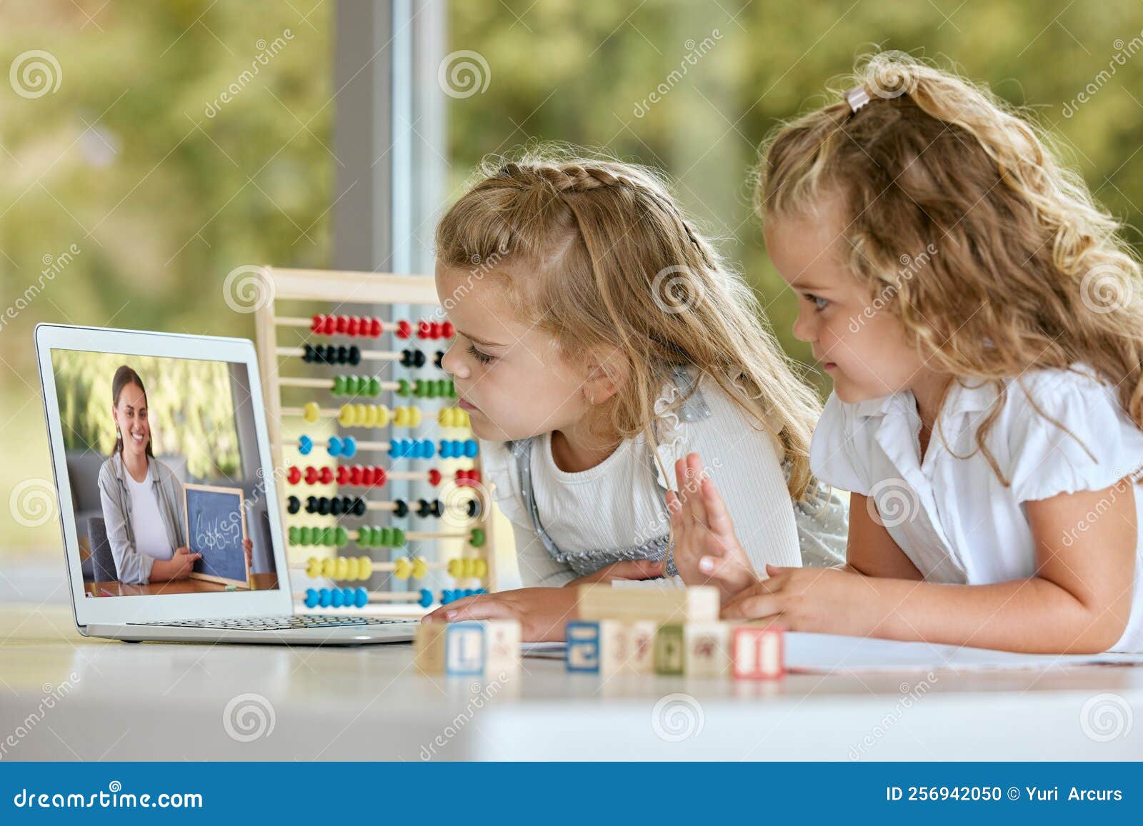 Laptop, Learning and Education with a Girl and Her Twin Sister in ...